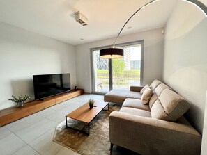 Apartamento | Sala de estar | Smart TV 