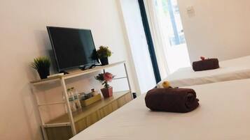 Quarto triplo standard | Wi-Fi de cortesia, roupa de cama