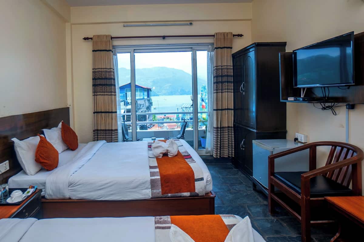 Roupas de cama premium, Wi-Fi de cortesia, roupa de cama