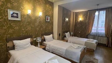 Quarto Triplo | 1 quarto, cofre no quarto, quartos insonorizados, Wi-fi grátis