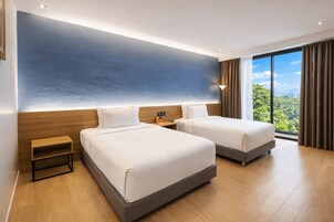 Quarto casal premier | Frigobar, escrivaninha, cortinas blackout, quartos à prova de som