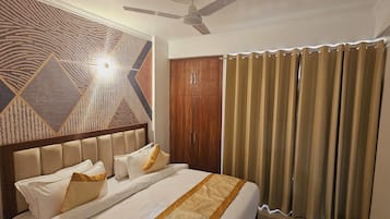 Quarto Familiar | Cortinas/cortinados opacos, ferro/tábua de engomar, Wi-fi grátis