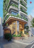 Um edifício moderno com várias varandas, cada uma decorada com vegetação exuberante.