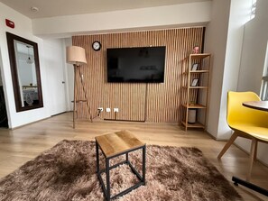 Apartamento Executivo | Sala | Televisor LCD de 43 polegadas com canais digitais, Netflix 