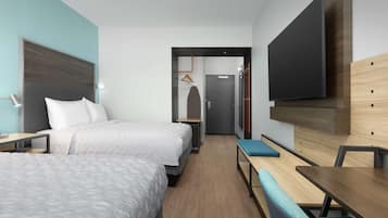 Quarto, 2 camas queen-size | Secretária, secretária adequada para computadores portáteis