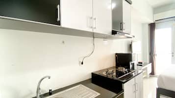 Estúdio | Cozinha privada | Minifrigorífico, uma placa de cozinha