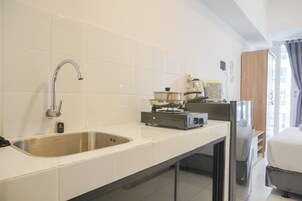 Estúdio | Cozinha privada | Um frigorífico/congelador grande, uma placa de cozinha