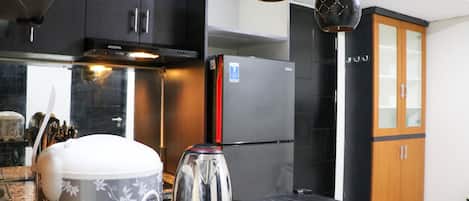 Apartamento | Cozinha privada | Um frigorífico/congelador grande, uma placa de cozinha