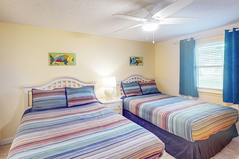 Gulf-front condo with beach access, pools, hot tub, & sports courts ...