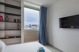 Estúdio básico | Wi-Fi de cortesia, roupa de cama