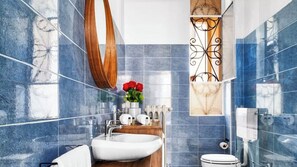Apartamento família | Banheiro | Bidê, toalhas de banho