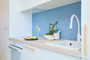 Apartamento (0 Bedroom) | Cozinha privada