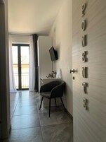 Quarto Deluxe | Cofre no quarto, secretária 