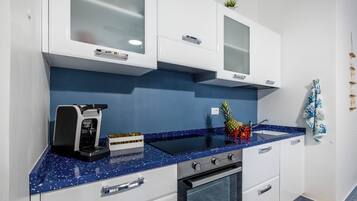 Apartamento | Cozinha privada | Uma máquina de lavar louça