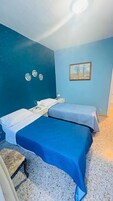 Quarto empresarial | Ferros/tábuas de passar roupa, roupa de cama