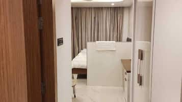 1 quarto, roupas de cama premium, cortinas blackout, Wi-Fi de cortesia