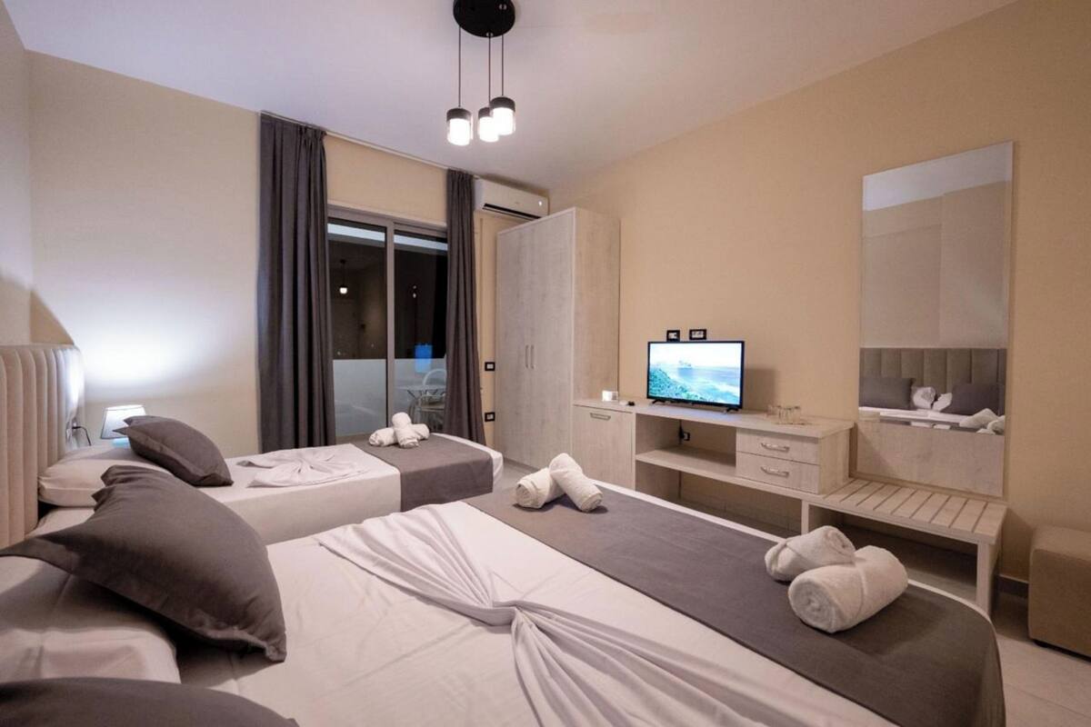 Quarto Triplo | Quartos insonorizados, Wi-fi grátis