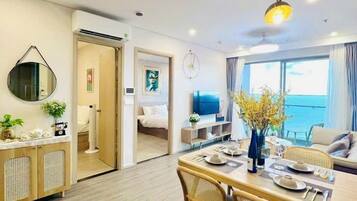 Apartamento premier | Área de estar | Smart TV 49 polegadas com canais a cabo