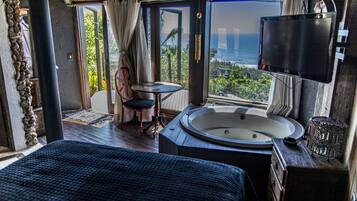 Suíte estúdio premier, 1 quarto, banheira de hidromassagem, vista para o mar | 1 quarto, frigobar, cofres nos quartos, individualmente mobiliados