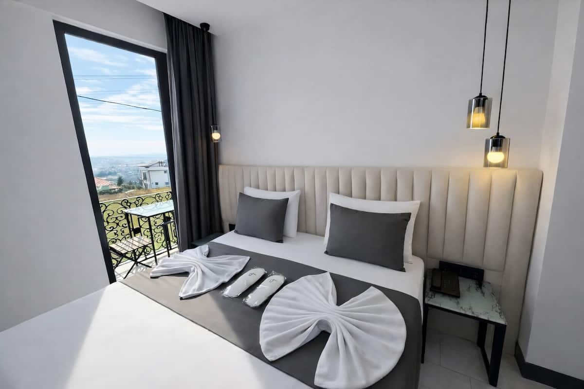 Quarto casal luxo, sacada | Terraço/pátio