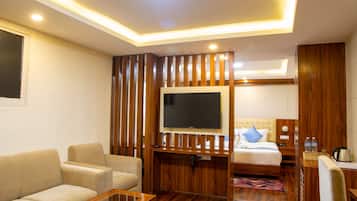 Suíte executiva | 1 quarto, ferros/tábuas de passar roupa, Wi-Fi de cortesia