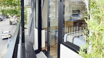 Quarto Triplo Deluxe | Secretária, cortinas/cortinados opacos, quartos insonorizados