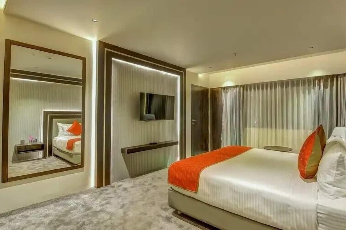 Suite Premium | Minibar, cofre no quarto, secretária, quartos insonorizados