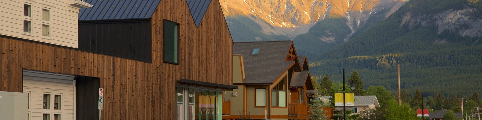 Canmore which includes a small town or village and mountains