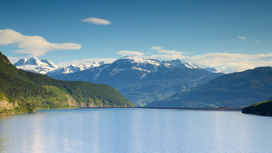 Revelstoke featuring mountains, a river or creek and tranquil scenes