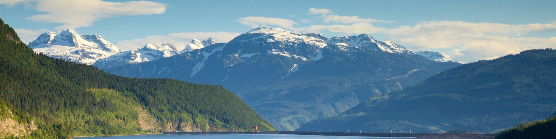 Revelstoke featuring mountains, a river or creek and tranquil scenes