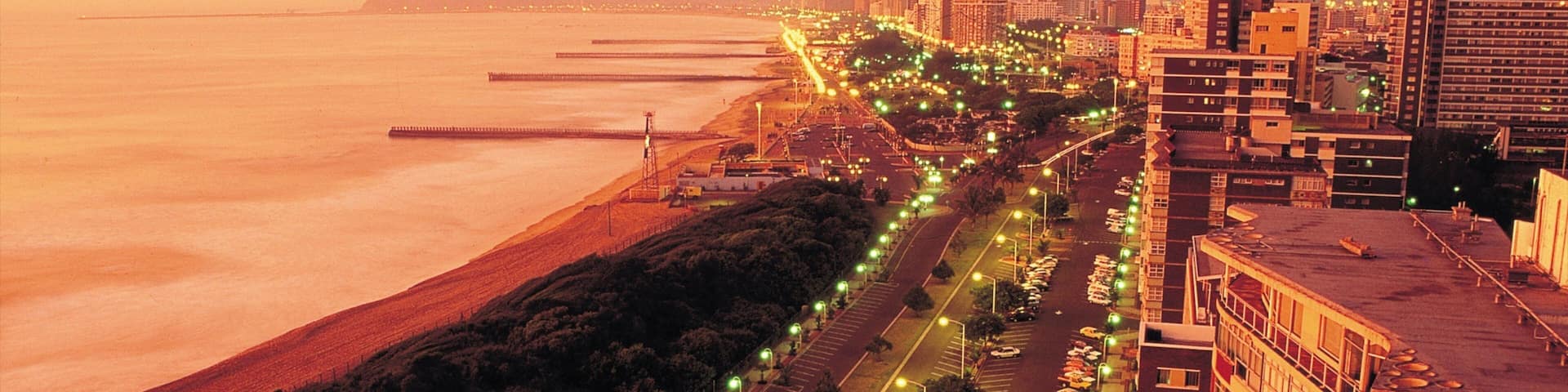 Durban showing a city, a high rise building and general coastal views