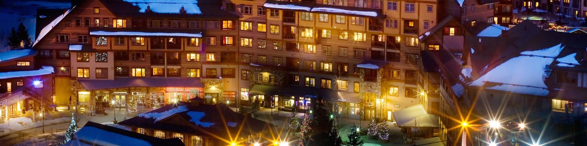 Winter Park featuring a luxury hotel or resort, snow and night scenes