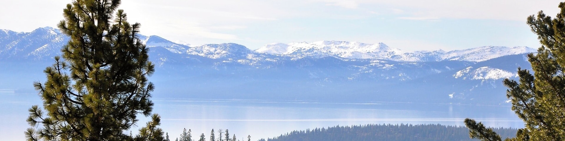 February 1st, and snow is sparse in Tahoe. We parked at the Brockway Summit Parking, but crossed the road and headed up the mountain on Spur Trail. It was warm and quiet.
About a 2 mile hike up to the vista point, and the view was not disappointing! Gorgeous lake and the company of good friends.
