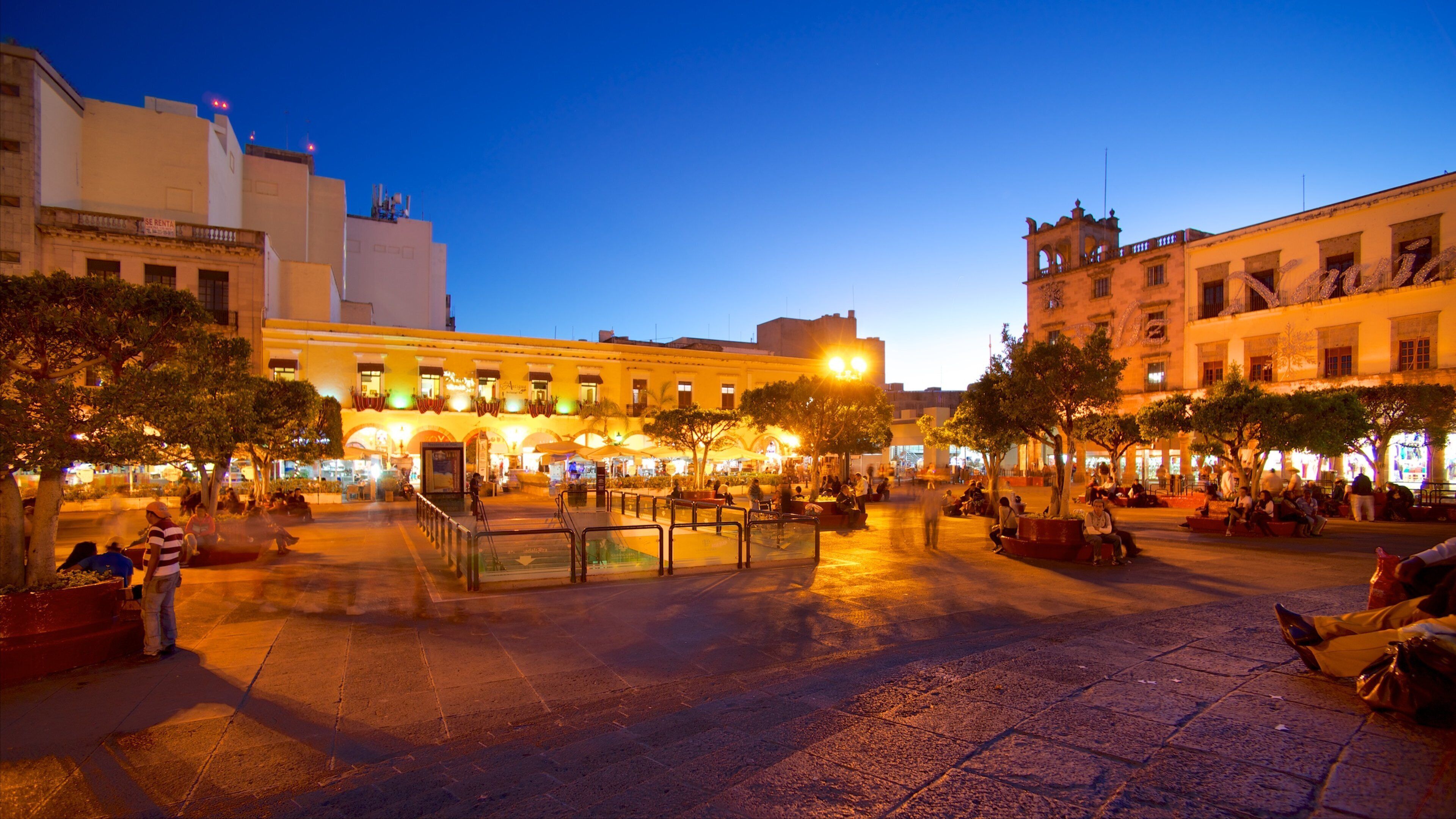 Mexico which includes night scenes and a square or plaza