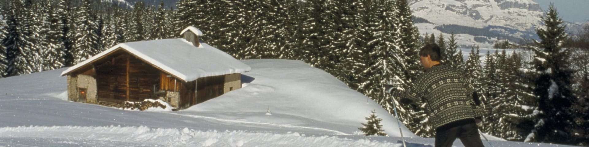 Megeve which includes a small town or village, snow and landscape views