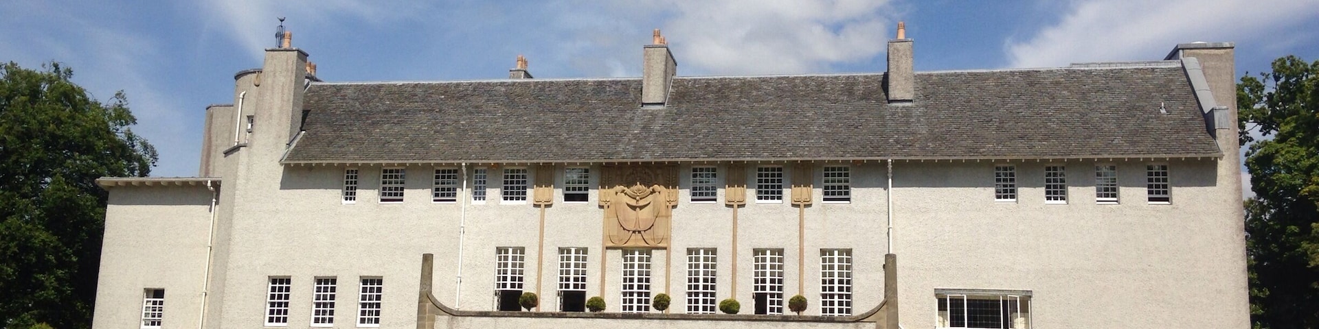 Charles Rennie Macintosh's "House For an Art Lover". A beautiful house where you can also have a lovely meal and then visit the walled garden afterwards.