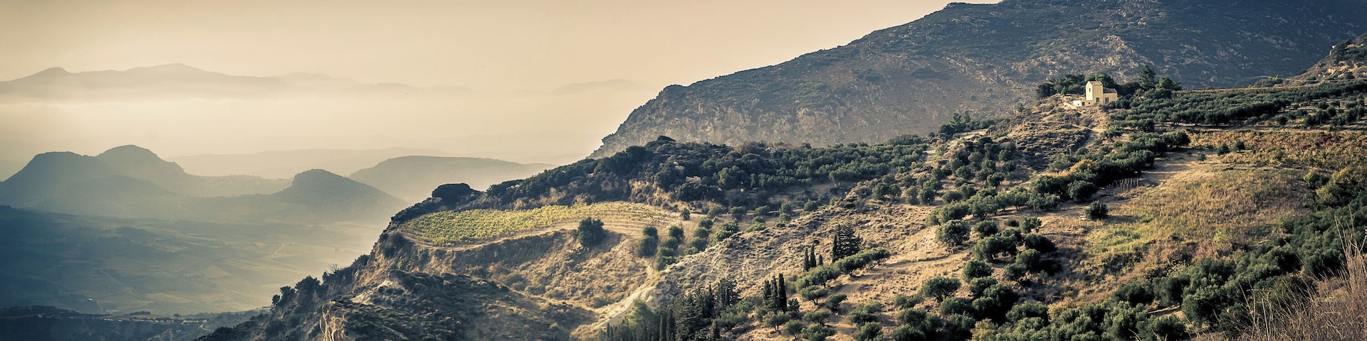 Just after the mountain top villages while on the way from Heraklion to Malata I saw this amazing view with what I believe is a farmhouse on the edge of a cliff.. Would likely be even better during sunset.
(I'm not 100% sure exactly where #ontheroad this view is so placed the marker where I think it was)