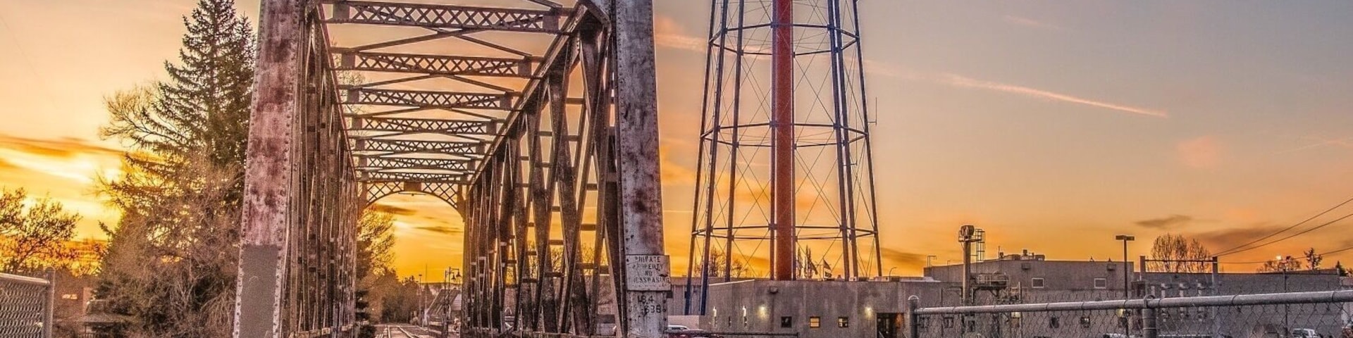 Historic view of the Idaho falls water tower and train bridge. The bridge was built in 1879 and the tower was erected at n 1937.