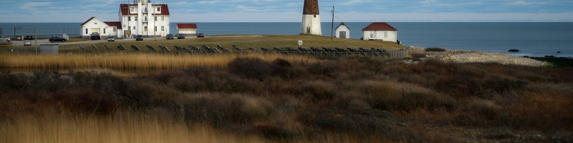 The Point Judith Light is located on the west side of the entrance to Narragansett Bay, Rhode Island as well as the north side of the eastern entrance to Block Island Sound. The confluence of two waterways make this area busy with water traffic and the waters around Point Judith are very cold and dangerous.
The site is very picturesque with plenty of locations to enjoy the seascape and take photos. The grounds are open to the public and there is enough parking space but the lighthouse itself has restricted accessibility since is still an active Coast Guard Station.
#lighthouse