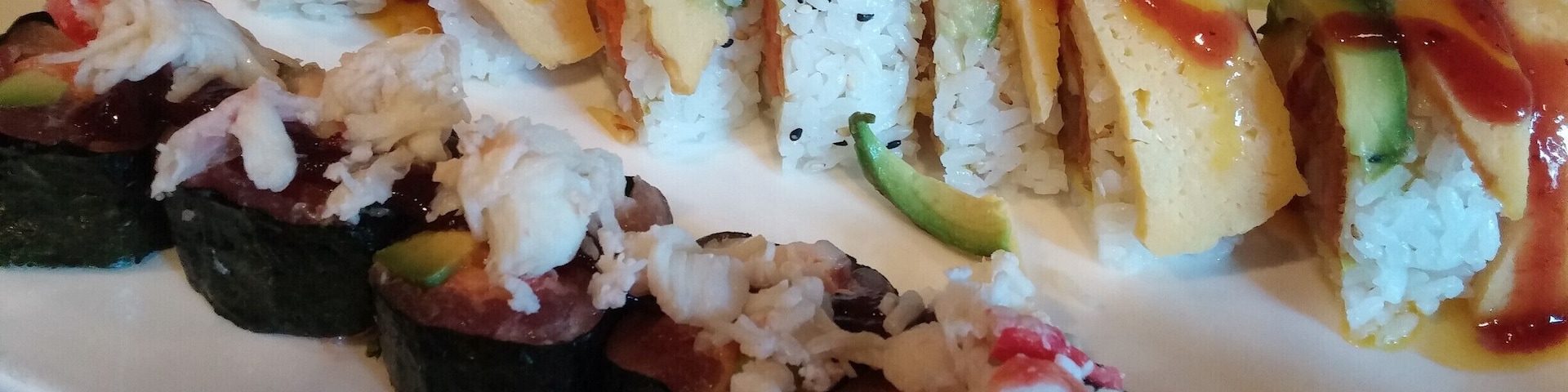 A selection of specialty rolls from Royal Ginger. The winner would have to be the Great Harvest roll with fried sweet potato, cream cheese, tempura shrimp with avocado, sweet egg, and mango pulp.