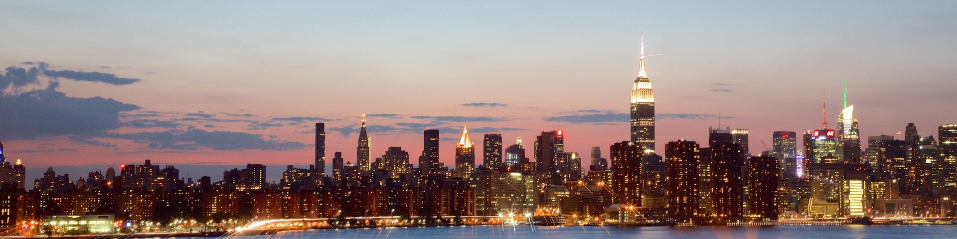 Brooklyn showing a river or creek, a city and a sunset