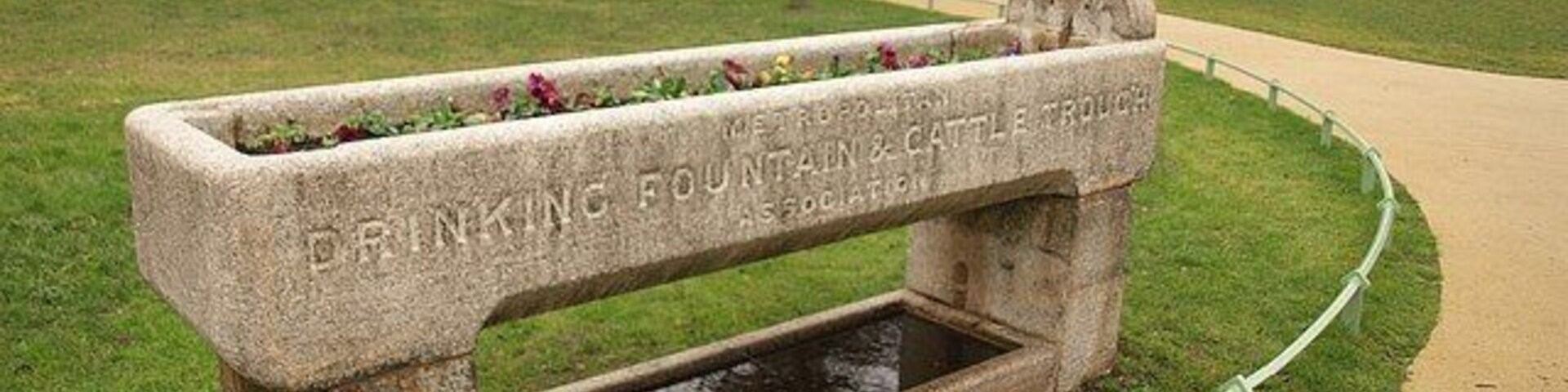 Drinking fountain, South Park Gardens According to a noticeboard nearby, the "drinking fountain and cattle trough" was presented to the council as part of the Ellen Reardon bequest in 1898, but http://www.merton.gov.uk/living/planning/designandconservation/conservation_areas/sth_pk_gdns_ca_part_1-2.pdf gives a date of 1888.
