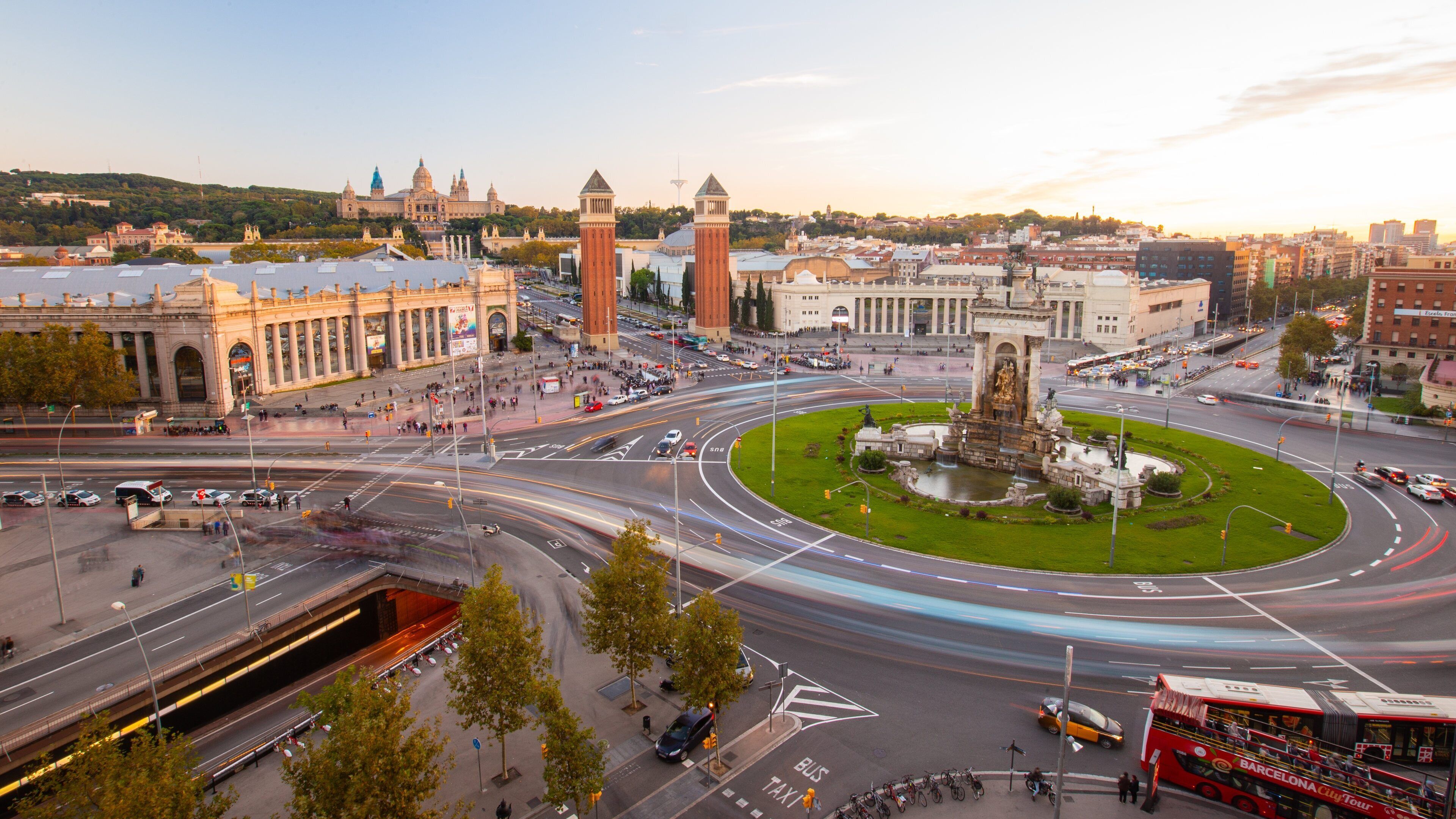 Placa d\'Espanya which includes a sunset, landscape views and a city