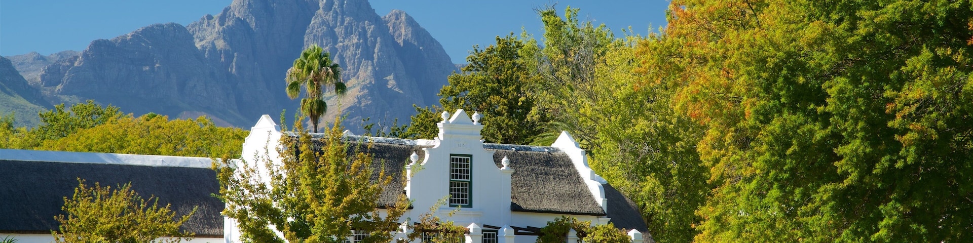 Stellenbosch que inclui montanhas, um parque e uma casa
