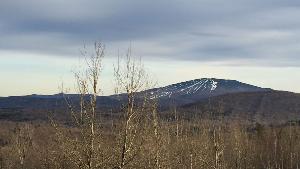 View of Stratton Mtn from Bromley Mtn in Vermont. Early spring.