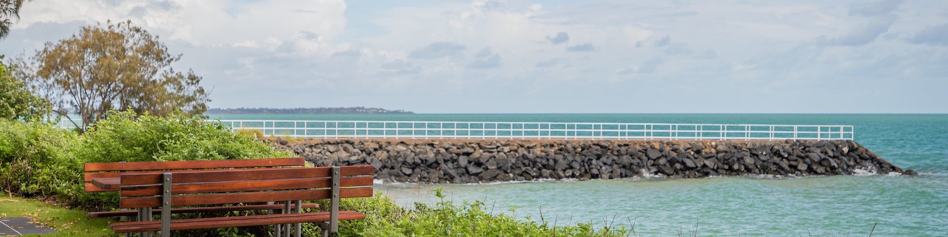 Urangan which includes a garden and general coastal views