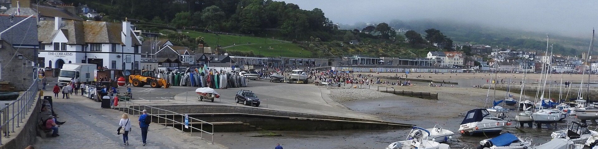 The Cobb an old stone pier forming an extensive harbour and believed to date from the time of Edward I. The origin of the name is unknown, but there are records of an ancient feast called the “Cobb Ale Feast”. With a length of 870 feet the curve of the Cobb forms a fine promenade though its upper surface slopes to the sea at an appreciable angle. Its high wall makes it a double promenade and walkers have a choice of shelter or a glorious blow.
#LikeALocal