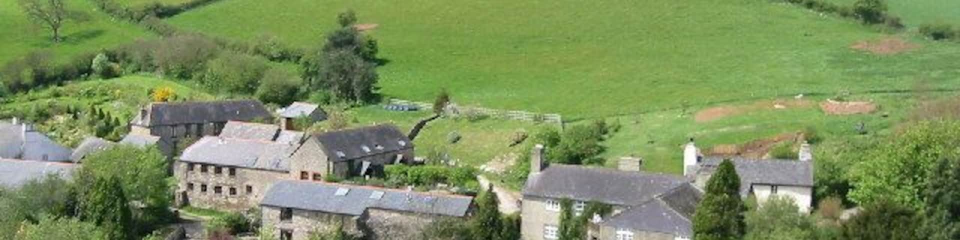 Aerial view of East Cornworthy. East Cornworthy is a hamlet of approximately 20 dwellings. The photo was taken using a remote-controlled camera lofted by a kite.