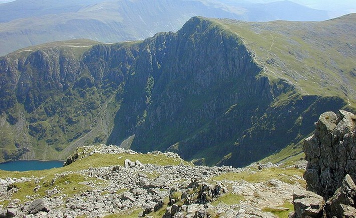 Craig Cau from Pen y Gadair Taken from a bit to the south of the summit, looking towards the great cliff of Craig Cau, the shorn off end of Mynydd Pencoed. Llyn Cau is just visible on the left.