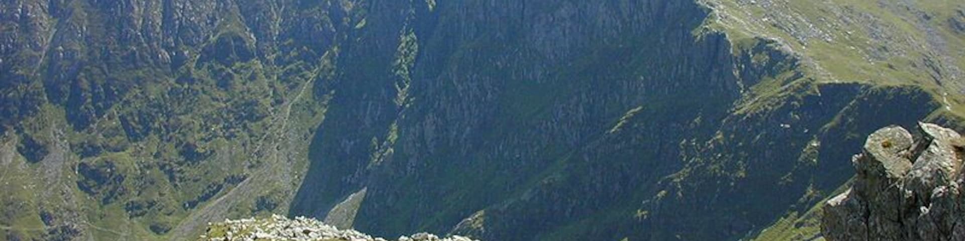 Craig Cau from Pen y Gadair Taken from a bit to the south of the summit, looking towards the great cliff of Craig Cau, the shorn off end of Mynydd Pencoed. Llyn Cau is just visible on the left.